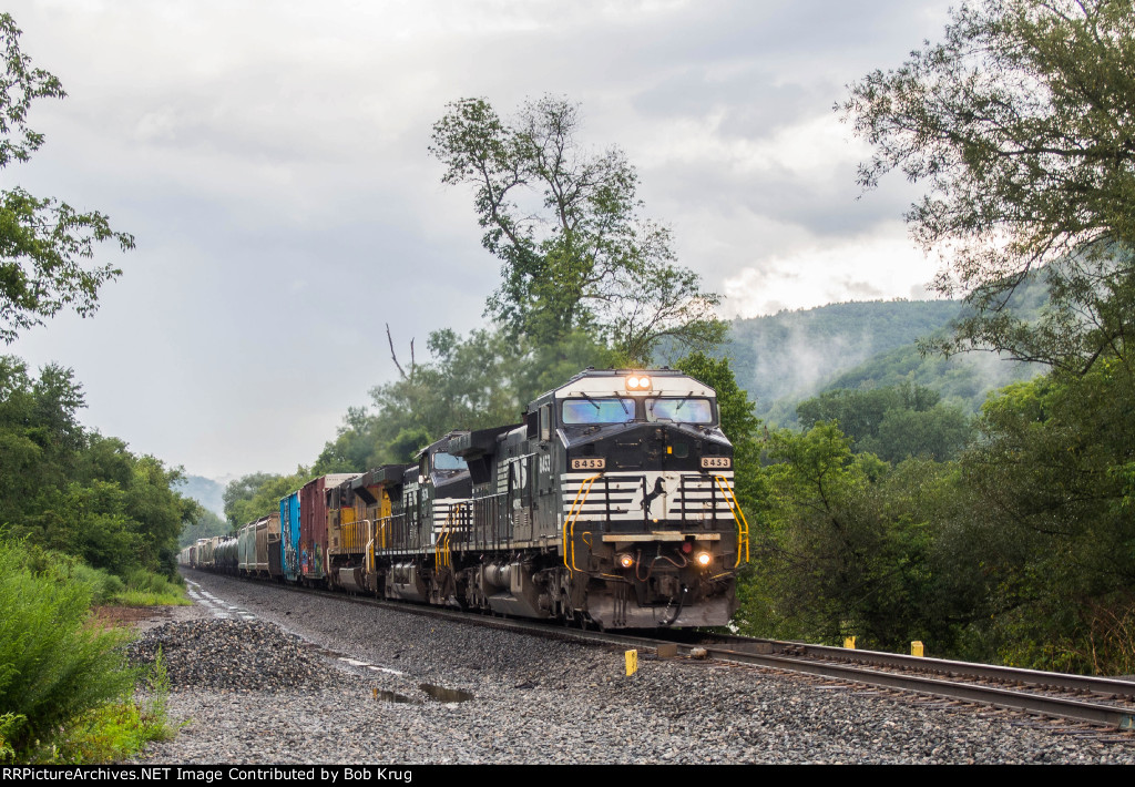 NS 8453 westbound up the Canisteo gorge between showers